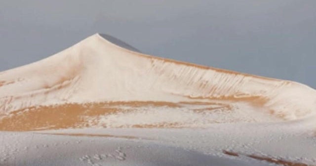 Rare snow falls in the Sahara Desert - CBS News