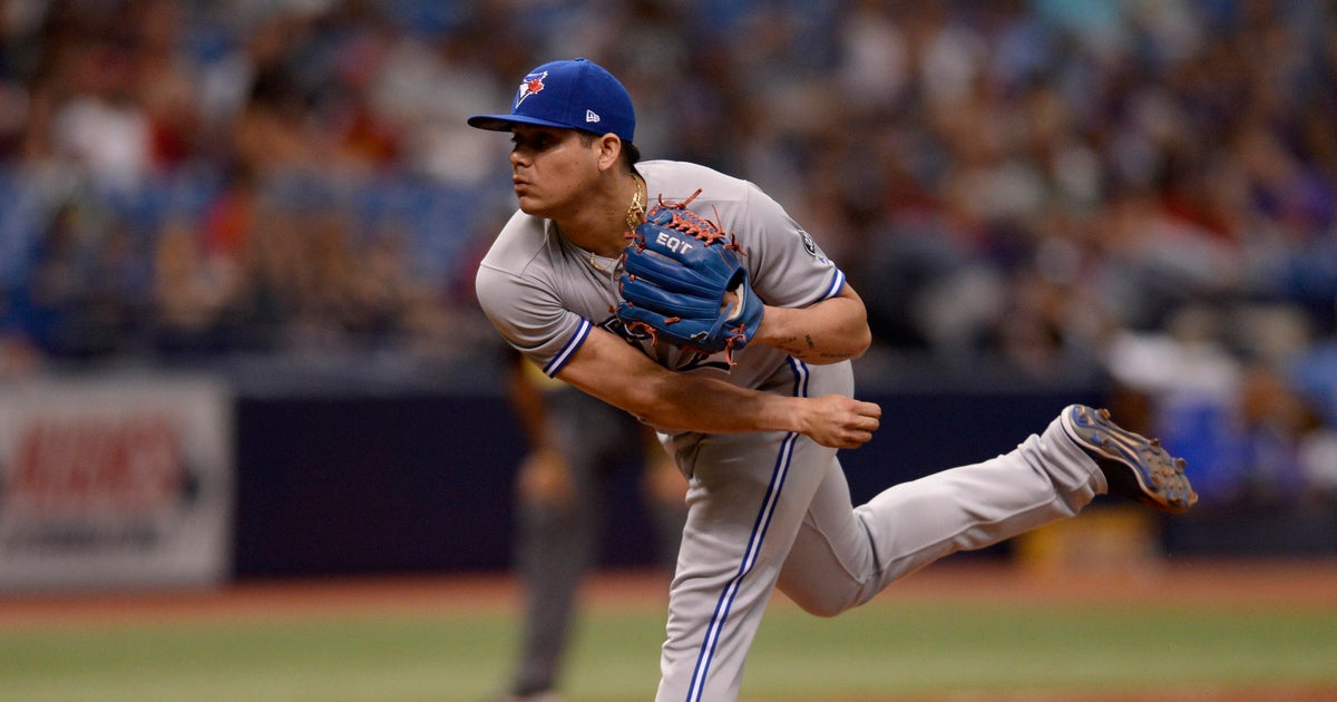 Roberto Osuna, Toronto Blue Jays pitcher, charged with assault - CBS News