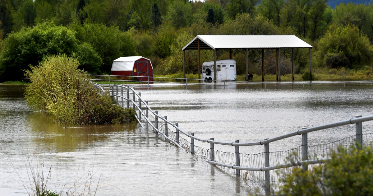 Montana's Clark Fork River crests at highest level in a century - CBS News
