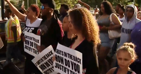 Protesters halt traffic during rush hour over fatal police shooting of ...