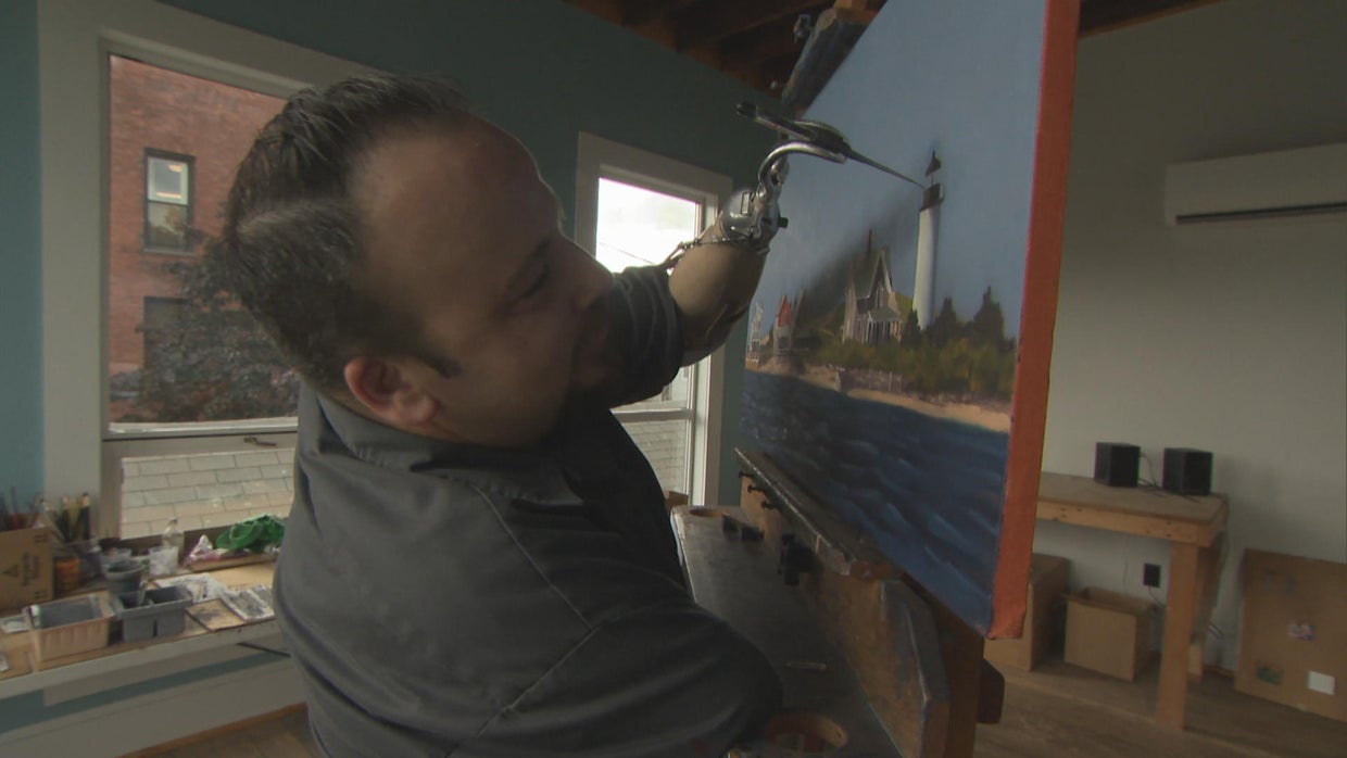 Veteran Peter Damon, who lost both arms in Iraq, discovers a talent for ...