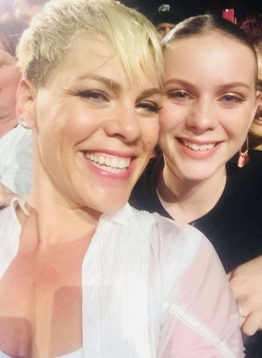 Pink walks into crowd mid-concert to hug teen after reading sign saying ...