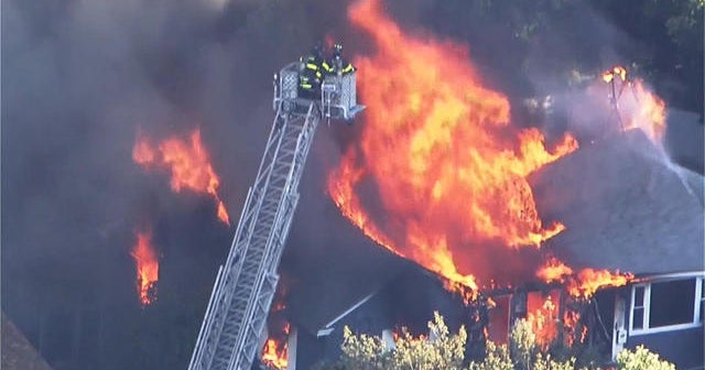 Flames from gas explosions engulf 60+ structures in 3 Mass. towns - CBS ...