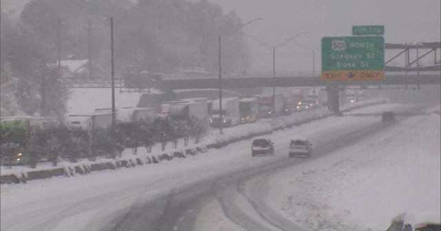 Southeast snow storm knocks out power to hundreds of thousands - CBS News