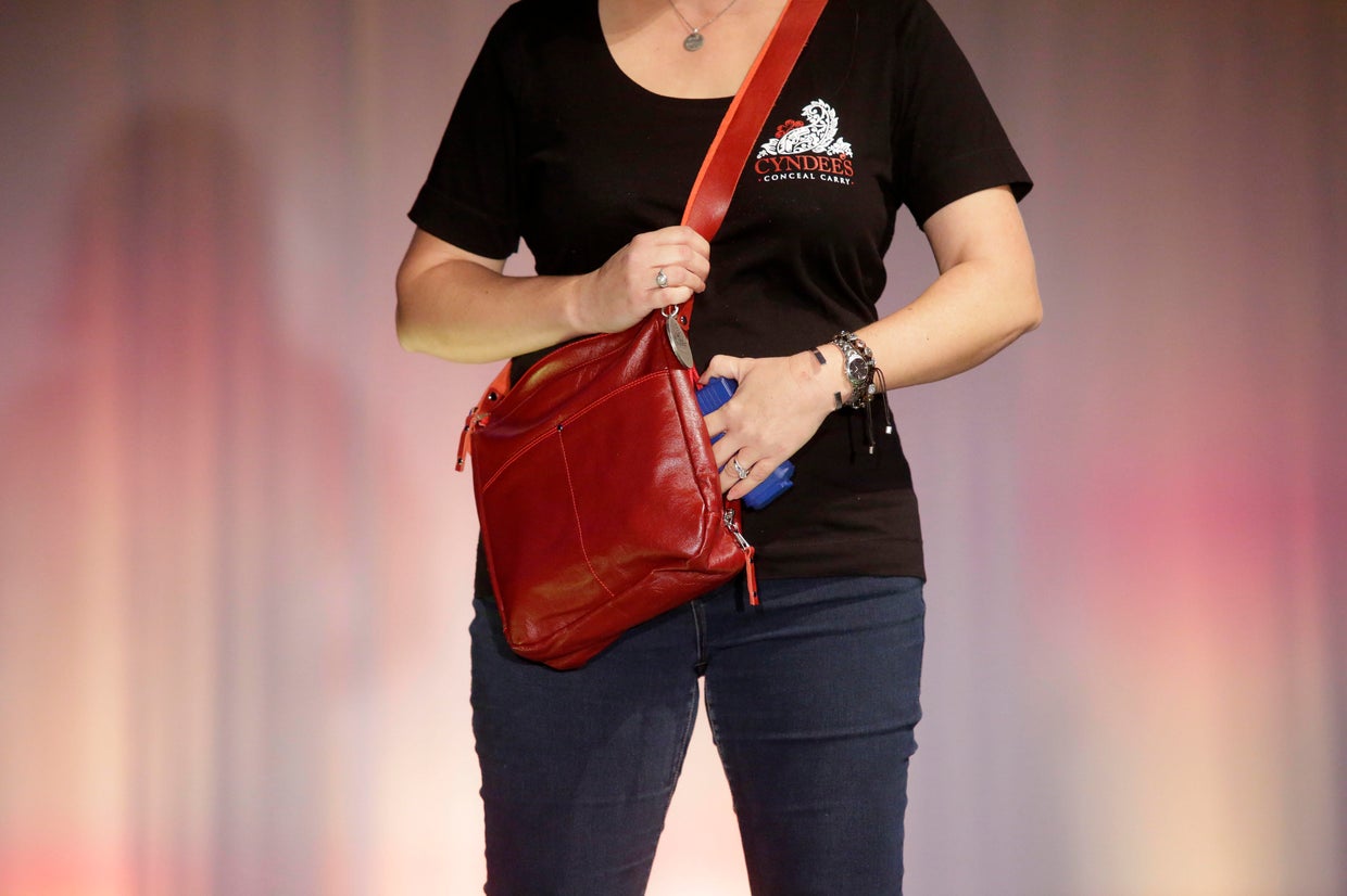Female gun ownership and the rise of fashionable "carrywear" - CBS News