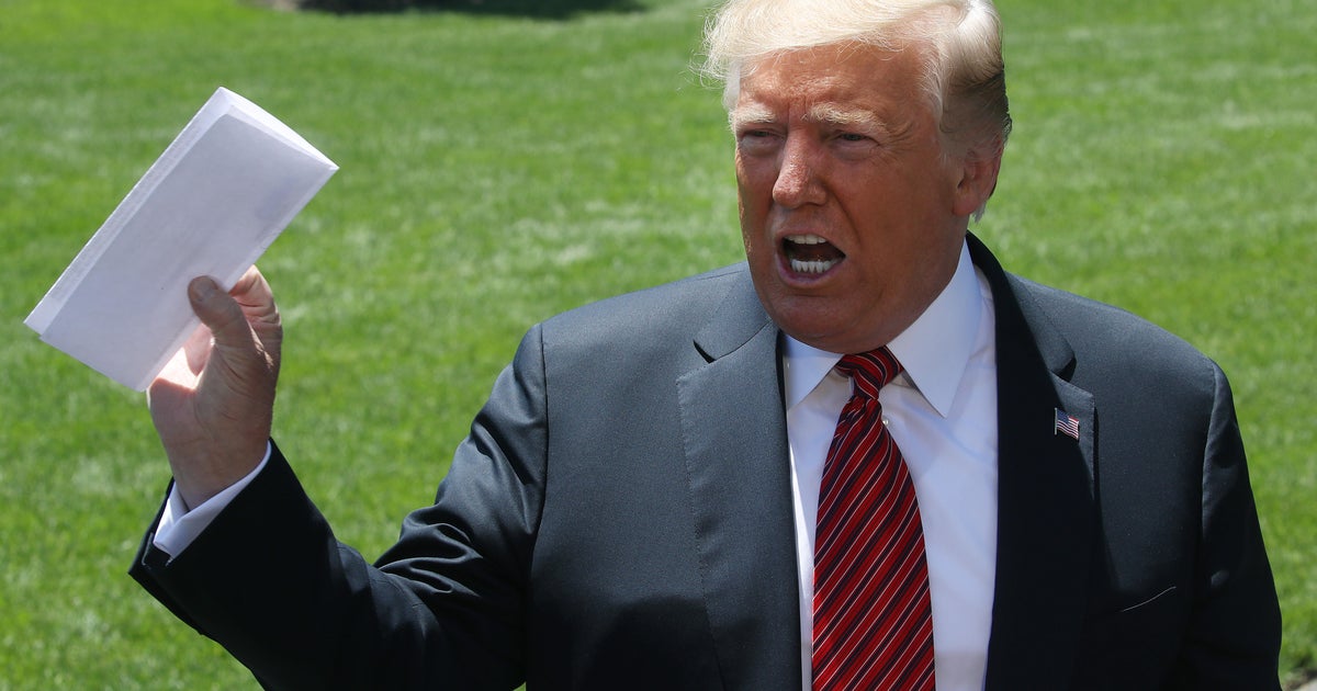 Trump waves sheet of paper that hints at deal to share burden on ...