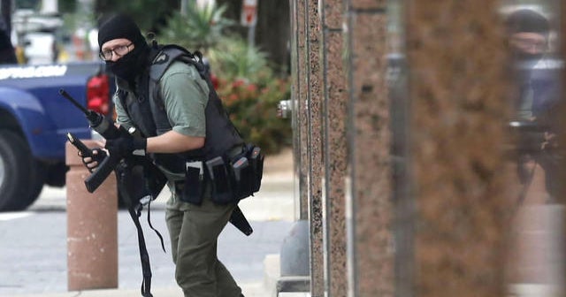 Army veteran killed after opening fire outside Dallas courthouse - CBS News