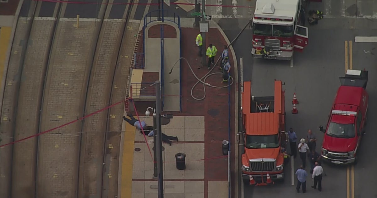Crews Rescue Baltimore DOT Employee Trapped In Manhole Downtown - CBS ...