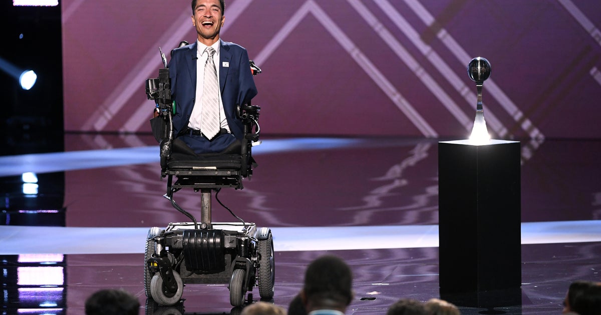 Football coach who was born without arms or legs shares story of ...