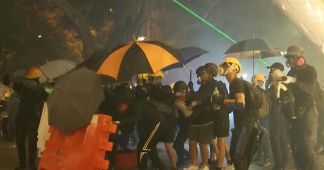 Hong Kong police tackle new protestor tactics as demonstrations ...