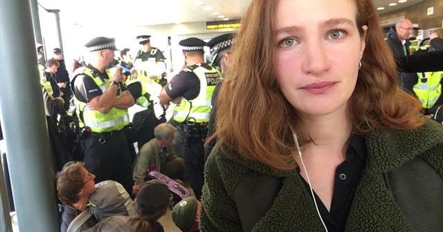 Climate-change protesters block entrance to London City Airport - CBS News