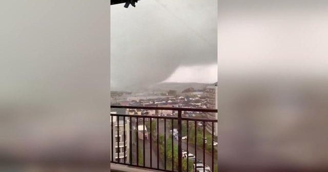 Earthquake strikes Tokyo as it braces for worst storm in decades - CBS News