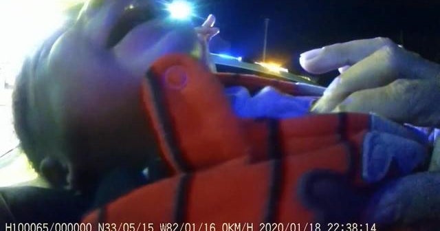 Police officer saves baby's life with infant CPR - CBS News