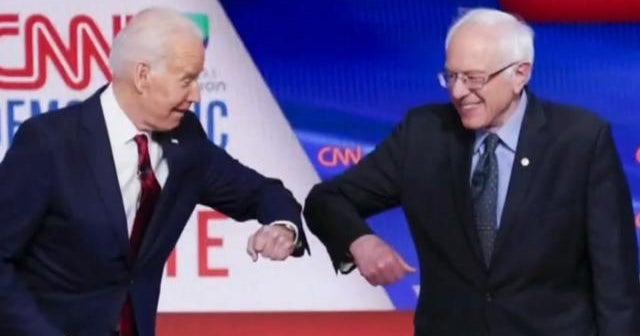 Coronavirus takes center stage at Democratic debate - CBS News