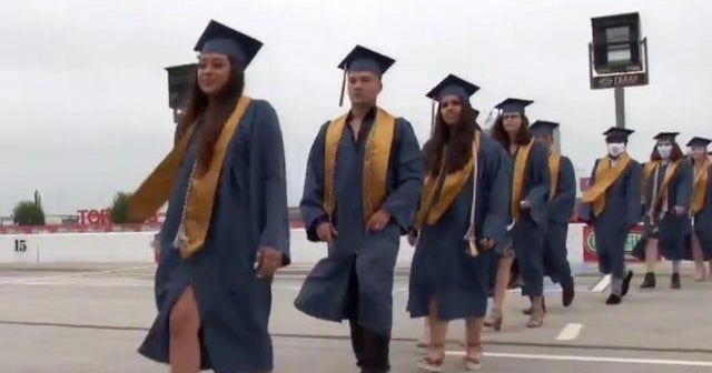 Texas high school holds graduation ceremony at speedway - CBS News