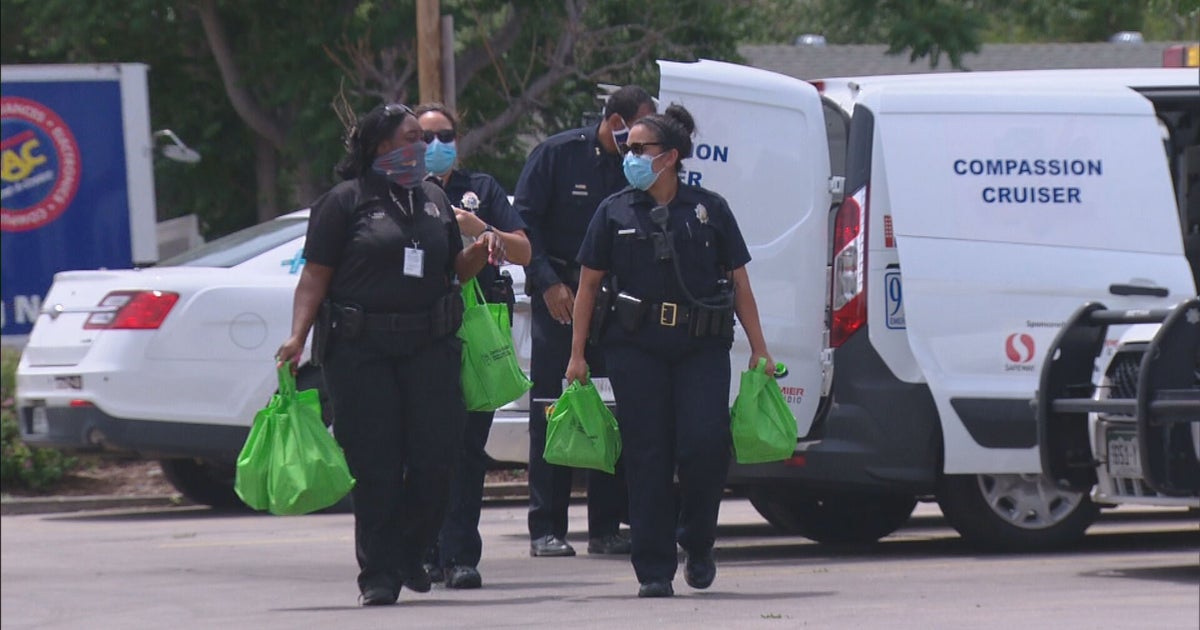 Denver Police Officers Give Back With 'Compassion Cruiser' - CBS Colorado