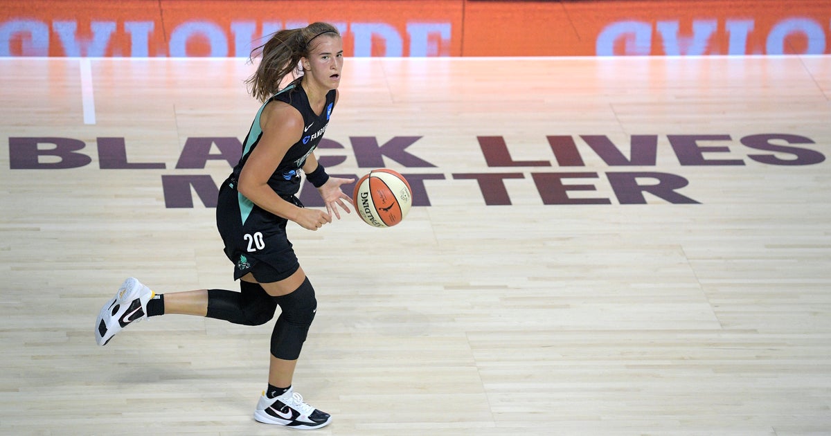 Storm and Liberty WNBA players walk off court before national anthem in ...