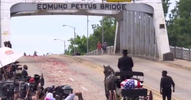 Civil rights icon Congressman John Lewis crosses Edmund Pettus Bridge ...