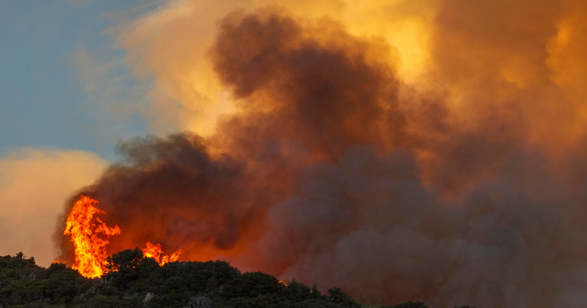 Apple Fire in California spreads to over 26,000 acres - CBS News