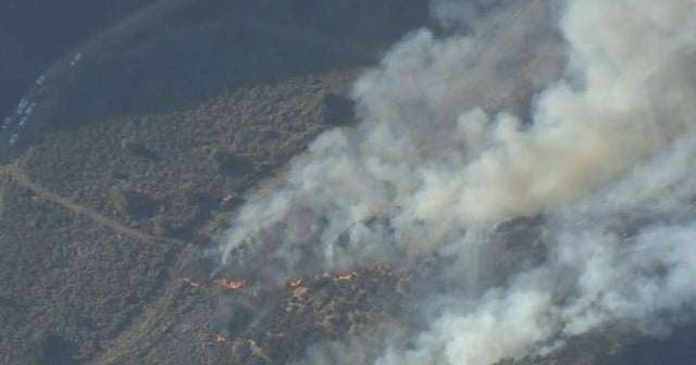 Apple Fire in California's Riverside County continues to grow - CBS News