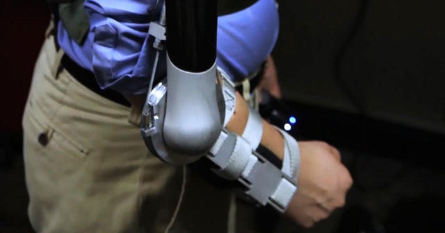 Students develop "titan arm" - CBS News