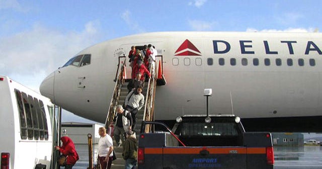 Delta makes changes to frequent-flyer program - CBS News