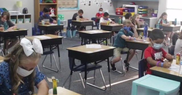 Inside a Texas school reopening for in-person learning - CBS News