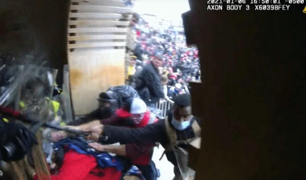 Man accused of beating officers with bat during Capitol riot said he ...