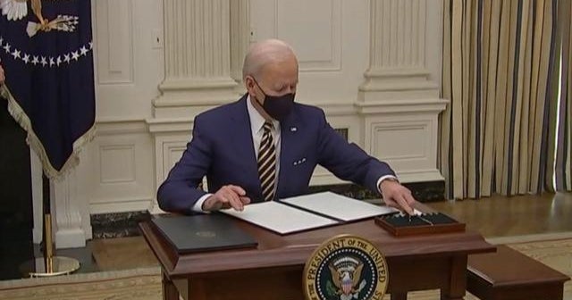 Biden takes executive action aimed at pandemic's economic fallout - CBS ...