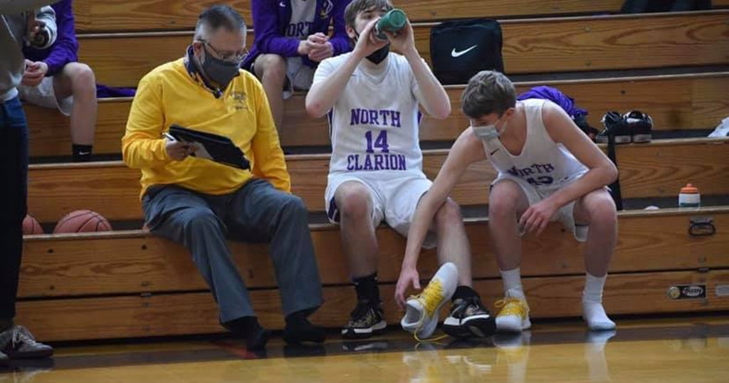 High School Basketball Coach Gives One Of His Players The Shoes Off Of ...