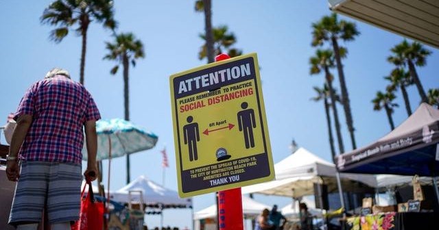 Could life return to normal by summer? - CBS News