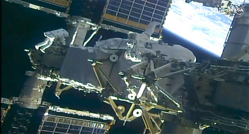 Spacewalkers begin space station power system upgrade - CBS News