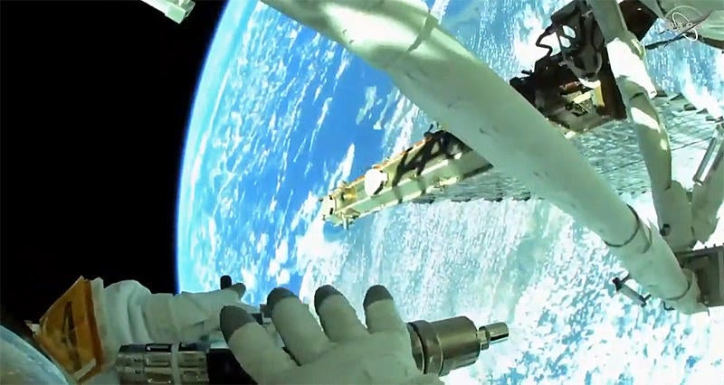 Spacewalkers begin space station power system upgrade - CBS News