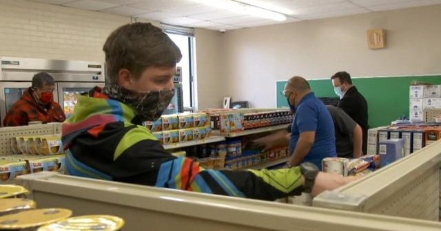 School's food bank provides students life lessons - CBS News