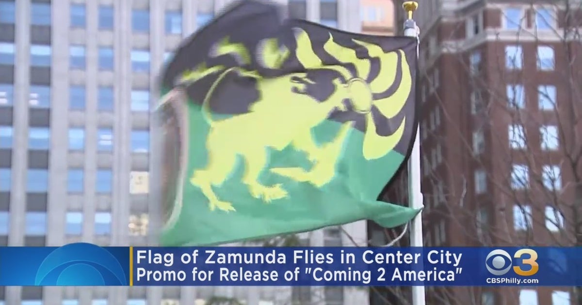 Flag Of Zamunda From 'Coming 2 America' Sequel Flies in Center City ...