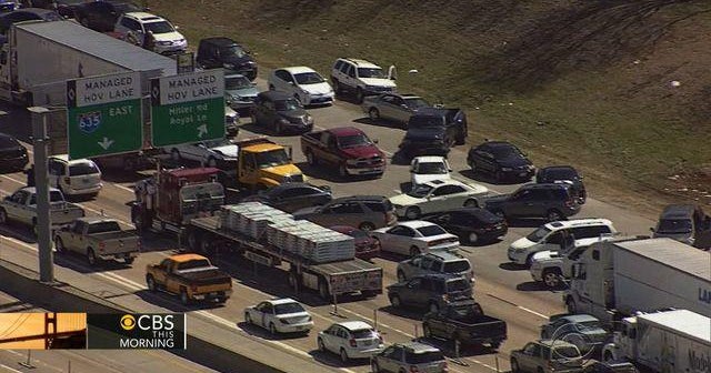 Drivers in Dallas turn around on road to avoid traffic jam - CBS News