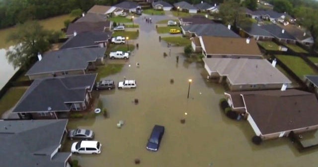 Parts of Florida reeling from two feet of rain - CBS News
