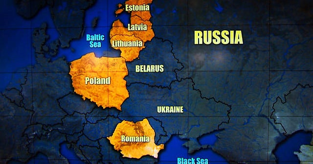 Russia threatens to retaliate for NATO build-up - CBS News