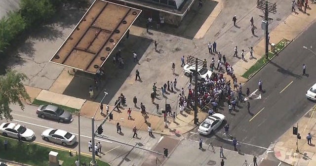 New police shooting adds to tension in St. Louis-area - CBS News