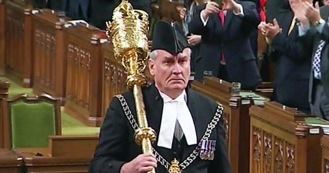 Canadian sergeant-at-arms gets standing ovation from Parliament - CBS News