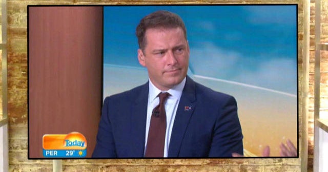 Australian news anchor wears same suit daily for a year to prove point ...