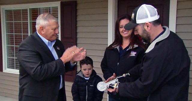 Severely wounded Army vet given new home - CBS News