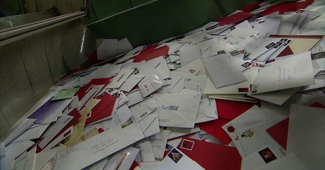 Busiest mailing day of the year hits U.S. Postal Service - CBS News