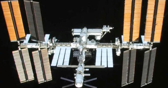 Leak forces partial evacuation of International Space Station - CBS News