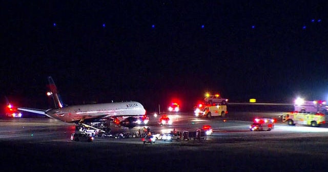 Delta flight evacuated after bomb threat - CBS News