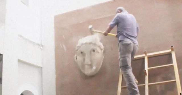 New video shows ISIS militants smashing artifacts - CBS News