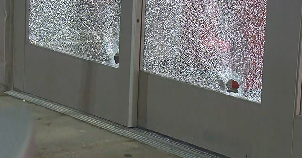 Bullet Shatters Glass Door At Target In Dorchester - CBS Boston