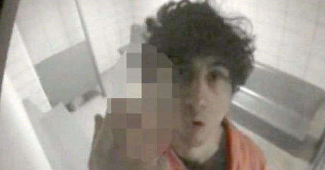 Dzhokhar Tsarnaev gives camera middle finger - CBS News