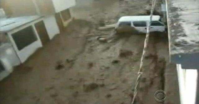 Watch: Deadly mudslides overtake streets in Peru - CBS News