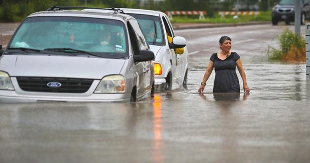 Death toll from floods continues to rise - CBS News